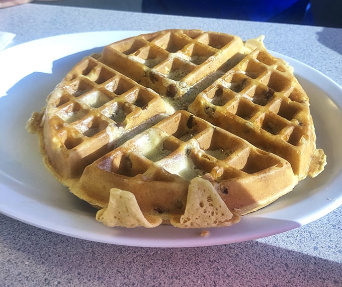 This Belgian waffle has more perfect squares than a math textbook. Golden, crisp, and ready for its maple syrup waterfall moment.