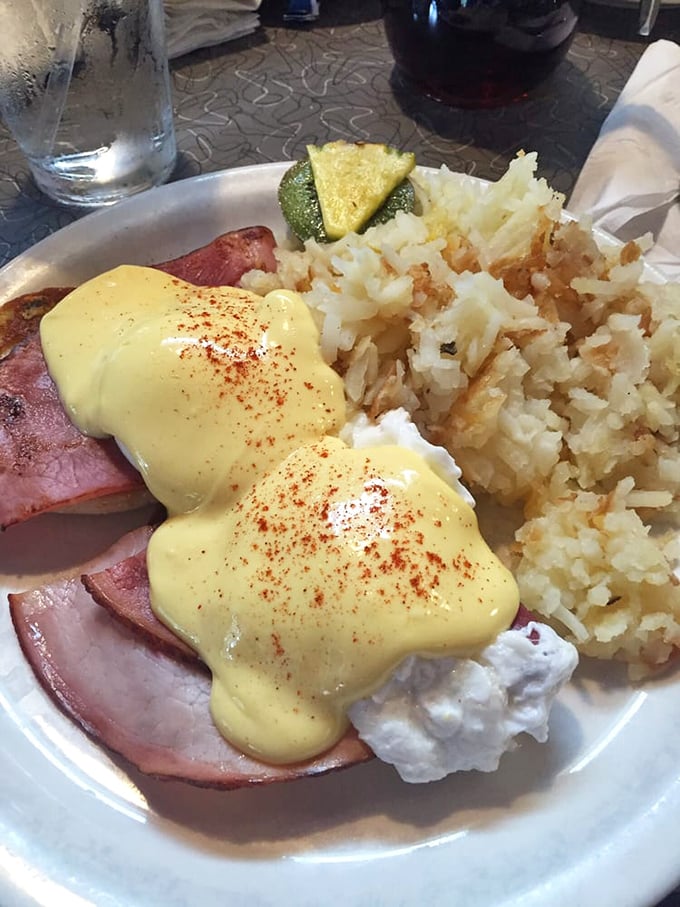 Eggs Benedict isn't just breakfast—it's architecture. That hollandaise cascading over ham like a yellow waterfall would make Michelangelo weep.