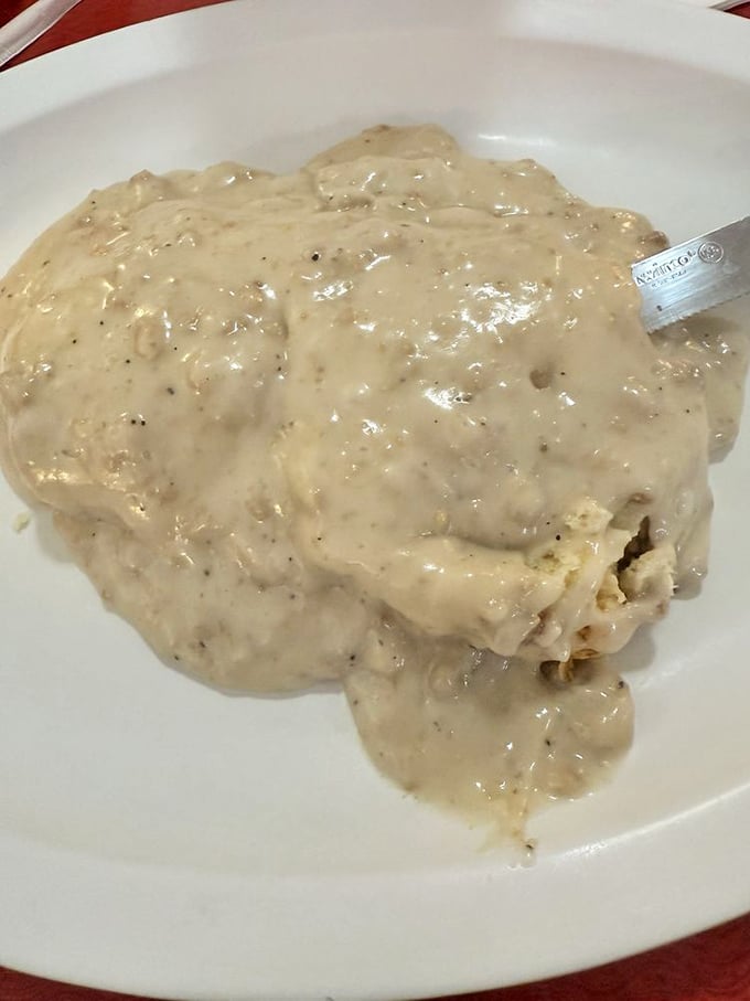 Biscuits and gravy—the Southern breakfast equivalent of a warm hug from your grandmother, only with more pepper.