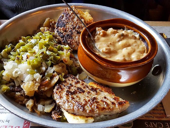 Home fries mingling with green peppers and a side of creamy gravy. This isn't just breakfast—it's edible therapy for whatever ails you.