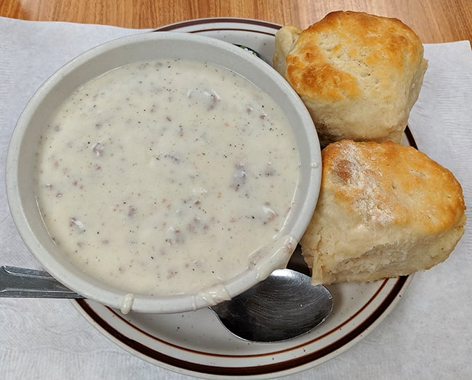 Comfort in a bowl—this creamy gravy-smothered biscuit situation is the culinary equivalent of a warm hug on a Michigan winter morning.