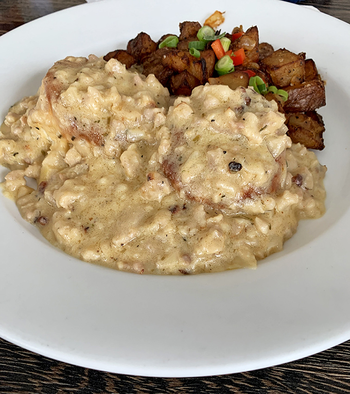Creamy, savory goodness alongside perfectly seasoned potatoes. This plate doesn't just feed your body – it hugs your soul on a cellular level.