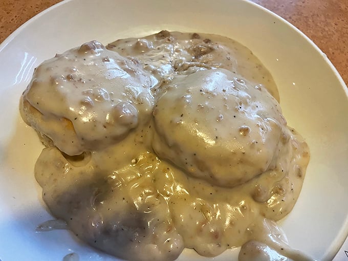 Biscuits swimming in creamy gravy—comfort food so satisfying it could make your grandmother jealous of someone else's cooking.