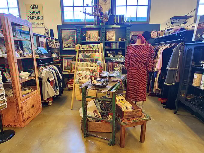 This booth feels like stepping into your coolest aunt's attic—vintage signs, curated knickknacks, and that perfect wooden table you didn't know you needed.