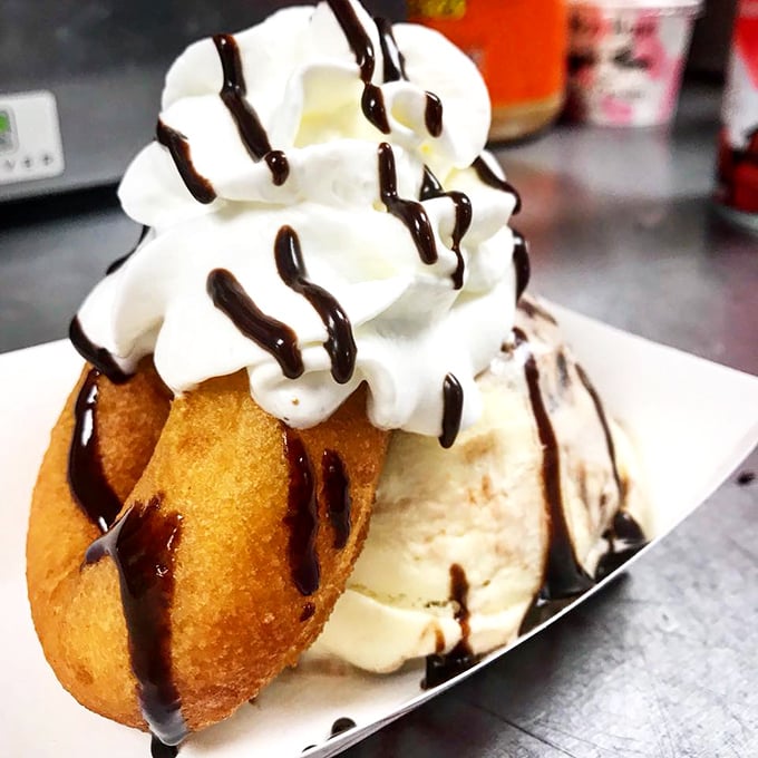 Not all heroes wear capes—some come on plates with whipped cream, chocolate drizzle, and what appears to be a donut base. 