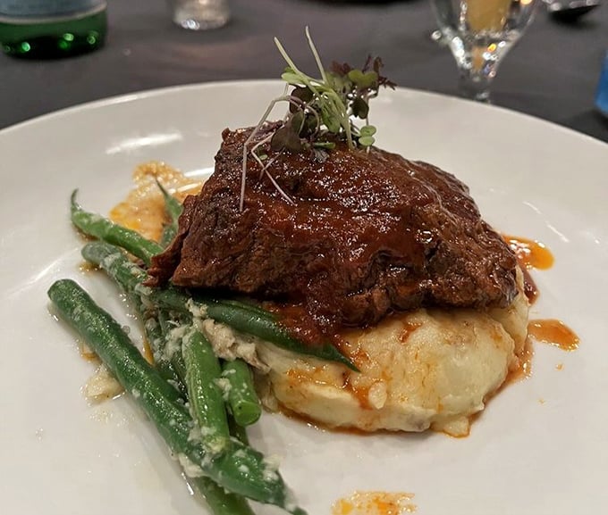 These braised short ribs don't just fall off the bone—they practically leap onto your fork in slow motion, begging to be savored with those perfect mashed potatoes.