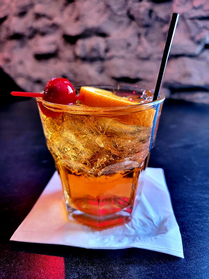 Wisconsin's unofficial state cocktail—the Brandy Old Fashioned—muddled with care and garnished with the kind of cherry that makes maraschinos jealous.
