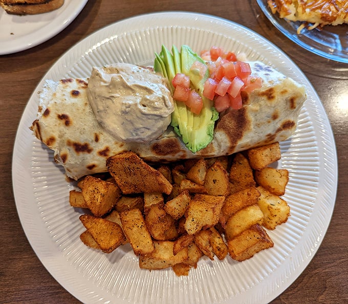 Breakfast burritos: where "handheld" meets "need two hands." Those home fries look like they've achieved the perfect crisp-to-tender ratio.