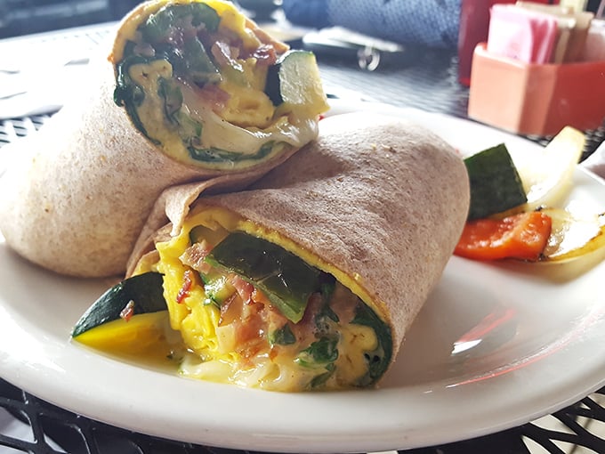 The breakfast burrito that makes Monday mornings bearable. Stuffed with vibrant veggies and wrapped with care—it's like a warm hug for your taste buds.