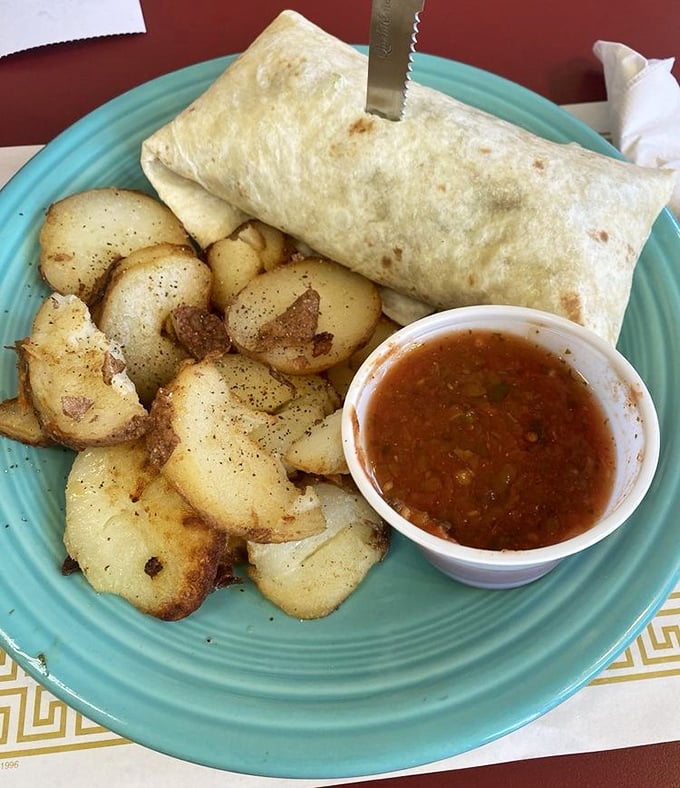 Breakfast burritos should always be this substantial—golden potatoes, a perfect wrap, and salsa with actual personality. Morning fuel done absolutely right.