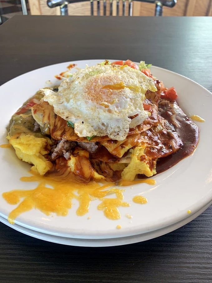 Breakfast goes New Mexican with this glorious mountain of flavors topped with a perfectly cooked egg—the morning equivalent of striking gold.