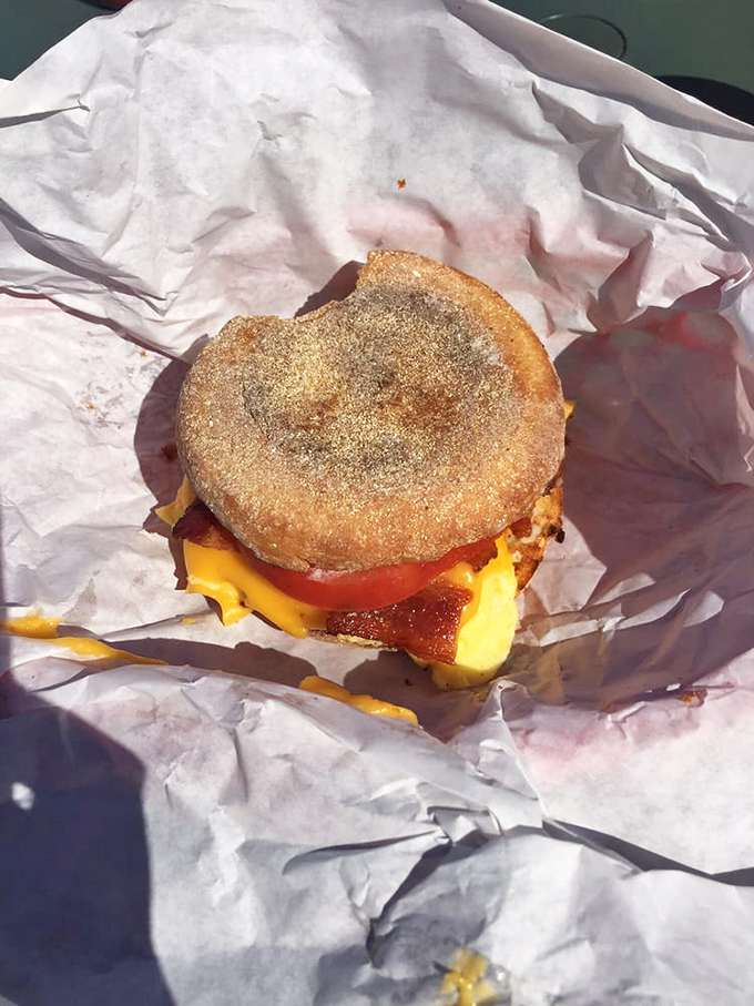 This isn't just a breakfast sandwich—it's morning architecture with perfectly toasted English muffins supporting the weight of your day's expectations.