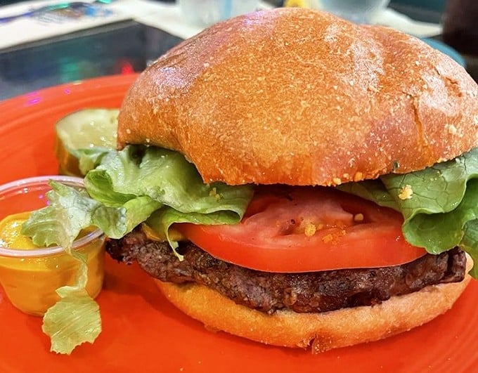 A burger so photogenic it deserves its own Instagram account, stacked high with fresh ingredients and pure satisfaction.