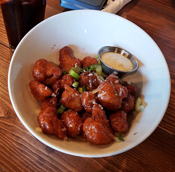Buffalo cauliflower that makes you question everything you thought you knew about vegetables – spicy, tangy, and utterly addictive.