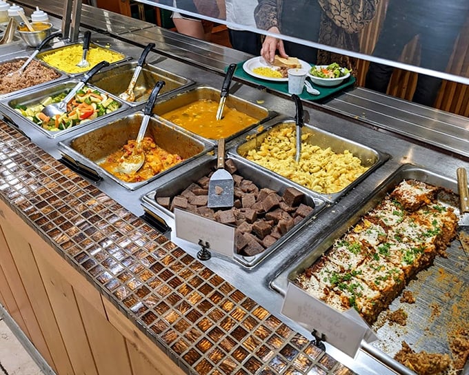 The buffet spread at Govinda's is like a United Nations of vegetarian delights, where every tray holds a new diplomatic mission to win over your taste buds.