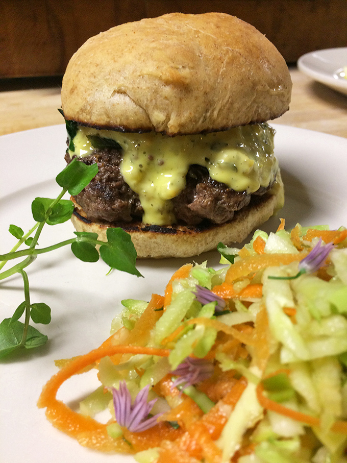This burger doesn't need a fancy name—just quality beef, house-made cheese sauce, and a bun that knows its supporting role perfectly.