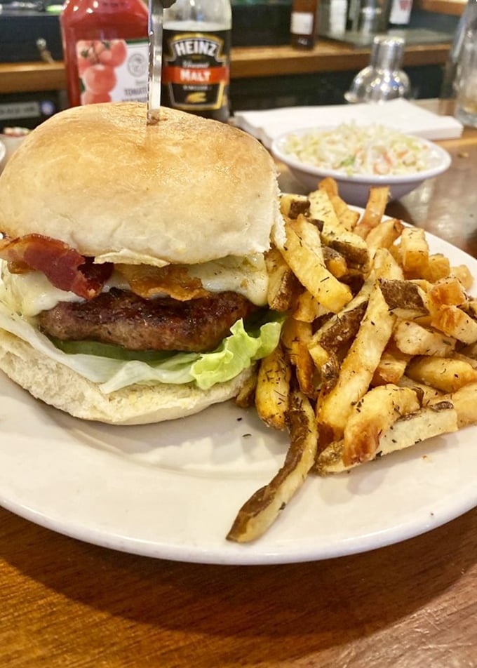 The burger that launched a thousand road trips. Those hand-cut fries aren't just sides—they're co-stars in this delicious production.