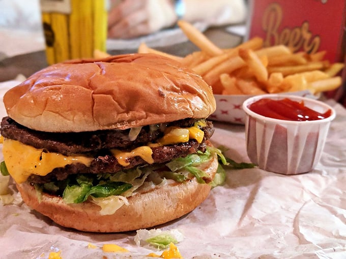 A burger that doesn't need fancy toppings or a clever name – just honest-to-goodness charcoal-grilled perfection with hand-cut fries on the side.