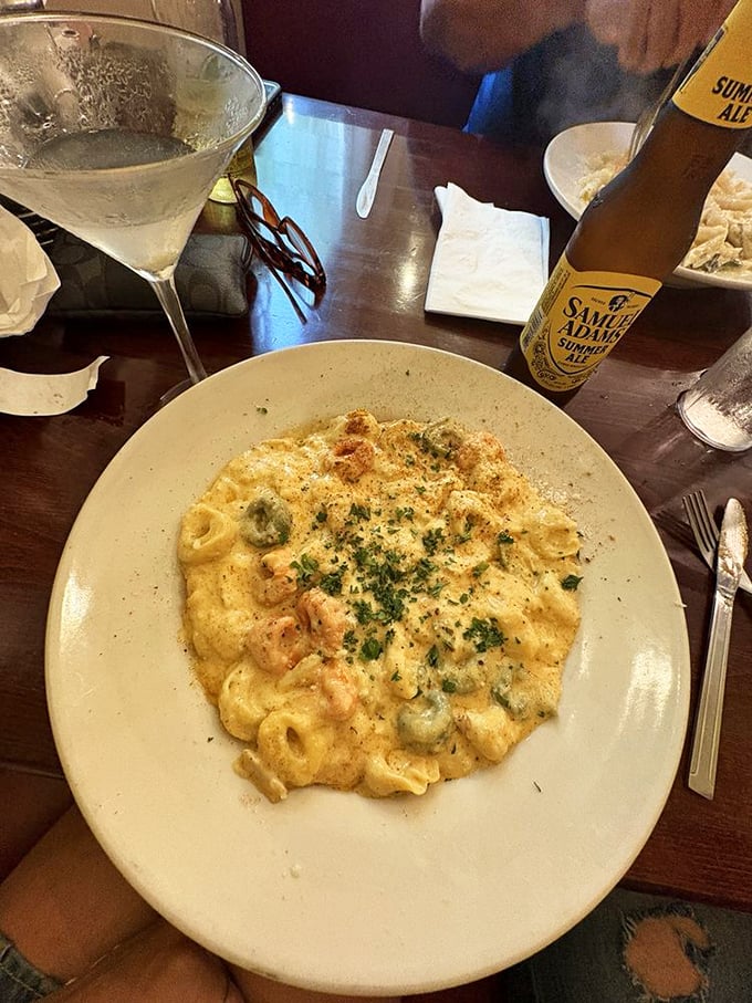 Creamy pasta that glistens with promise – the kind of comfort food that makes you want to hug the chef and ask for the recipe you'll never actually make at home.