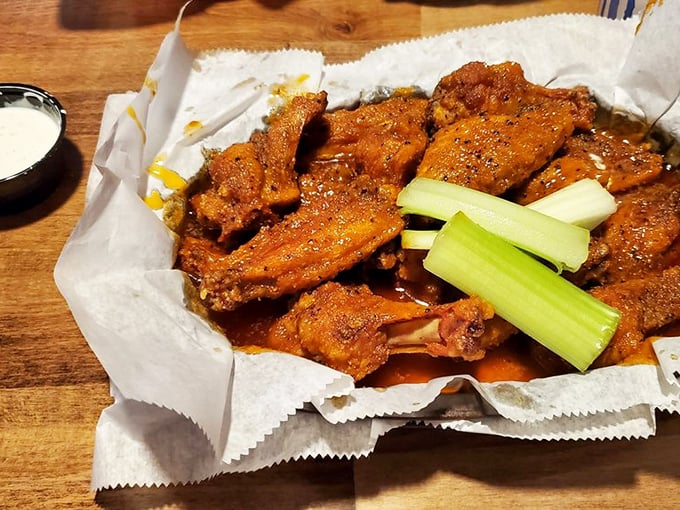 When sauce meets perfectly fried chicken, magic happens. These wings aren't just food; they're an experience worth the inevitable shirt stains. 