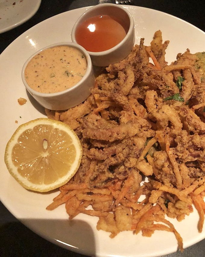 Calamari that defies the rubbery stereotype – crispy, tender, and served with dipping sauces that'll make you forget ketchup exists.