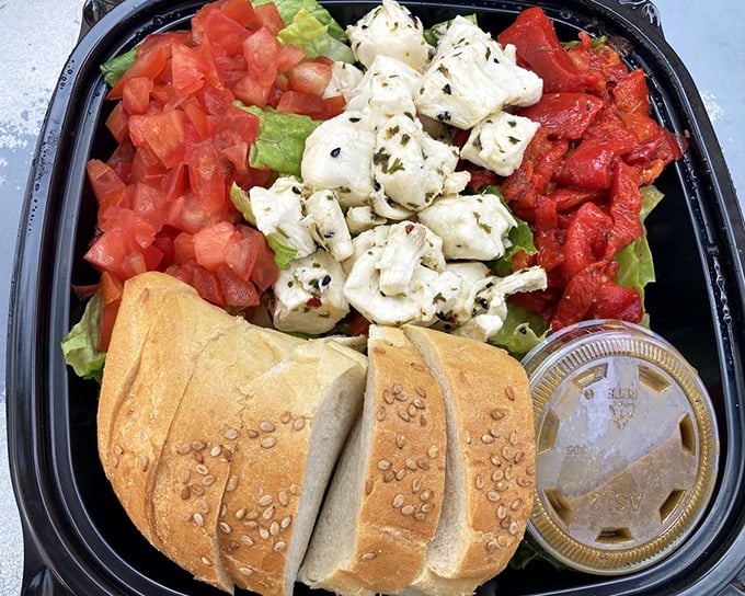 Fresh mozzarella, tomatoes, and greens create a colorful Italian flag on your plate – Campo's caprese salad brings Mediterranean sunshine to Philadelphia's historic streets.