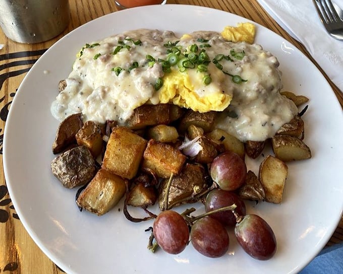 The famous cheddar biscuit breakfast—where gravy isn't just a topping, it's practically a religious experience. 
