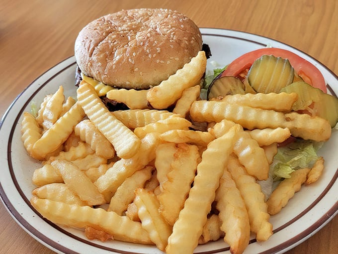 Sometimes a classic cheeseburger and crispy fries is all you need. No truffle oil, no aioli – just honest-to-goodness American comfort on a plate.
