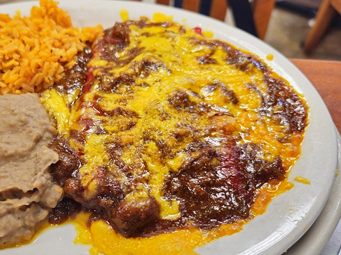 That cheese-smothered enchilada isn't just food—it's proof that San Antonio understands the perfect marriage of Tex and Mex cuisines.