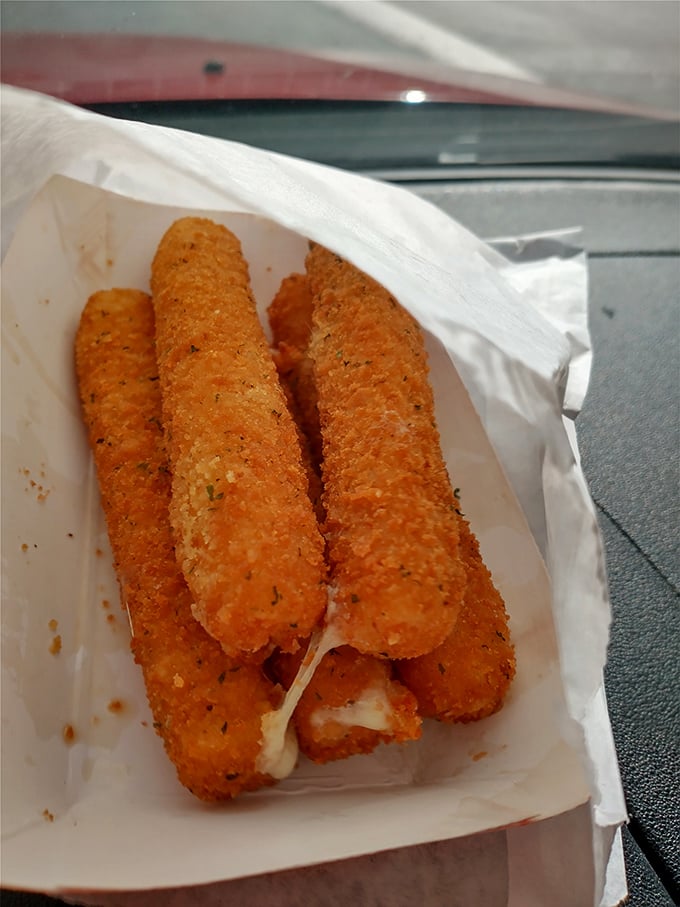 Cheese sticks that stretch for days—the kind that make you wonder why fancy restaurants don't serve these instead of amuse-bouches.