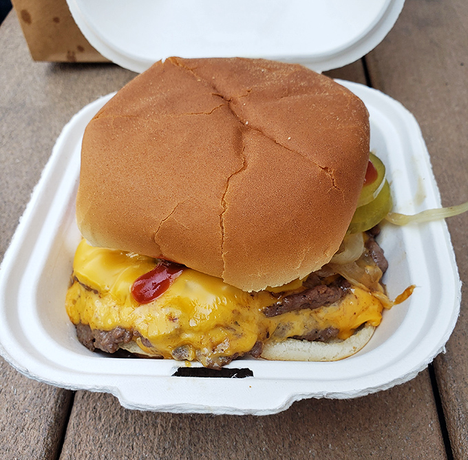 This isn't just a cheeseburger—it's a masterclass in American comfort food architecture, where every ingredient knows its perfect place.