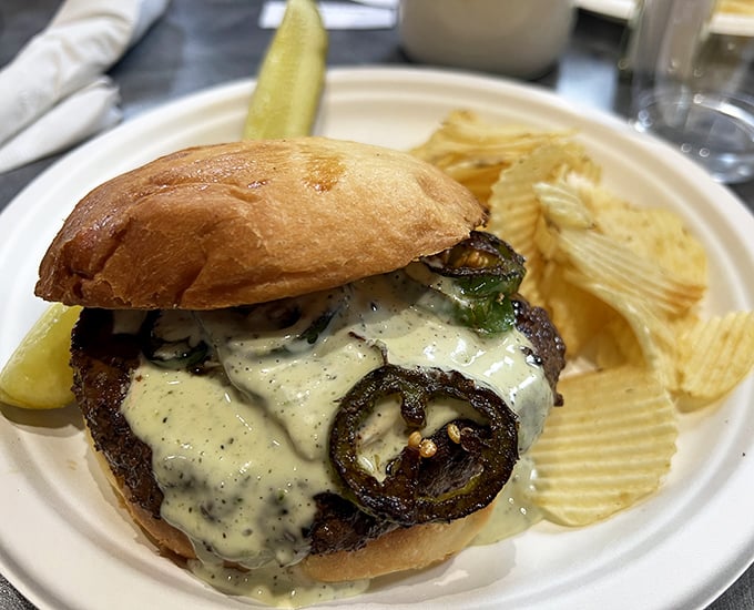 This isn't just a burger—it's architecture with jalapeños. The melty cheese and toasted bun create a handheld masterpiece worth the napkin investment.