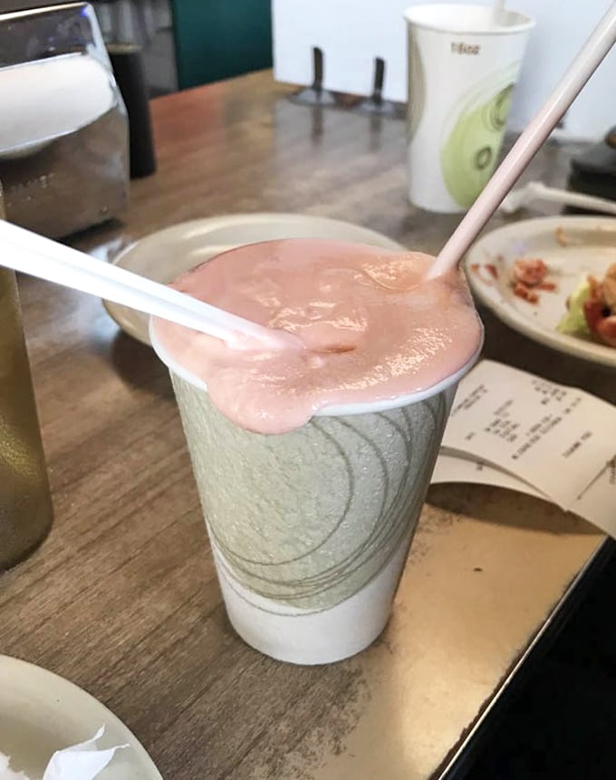 This strawberry shake isn't just thick—it's the kind that makes you wonder if "spoon" should be listed as the required utensil rather than "straw."