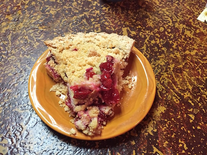 Cherry pie with a crumb topping that makes you wonder if you've been eating the wrong desserts your entire life. This isn't just pie—it's an epiphany.