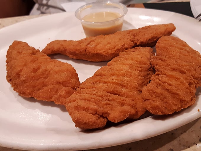 Chicken tenders that have clearly been introduced to hot oil under optimal circumstances, resulting in a golden-brown perfection that fast food chains can only dream about.