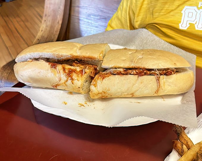 The sandwich equivalent of a warm hug—chicken parmesan nestled in fresh bread with cheese melting like an Italian sunset. Nonna would approve.