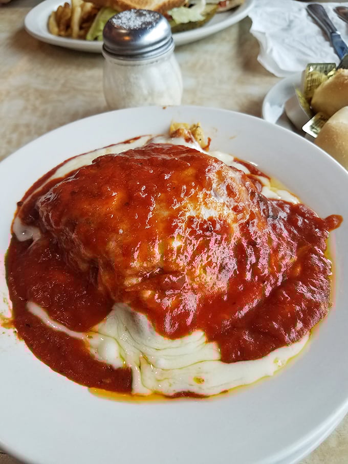 Red sauce dreams come true! This chicken parm doesn't just sit on the plate – it commands attention like an Italian opera singer.