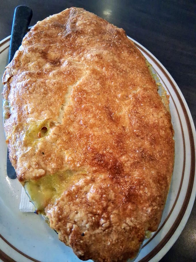 This golden-crusted omelet isn't just breakfast—it's an edible sunrise that promises to brighten even the cloudiest Florida morning.