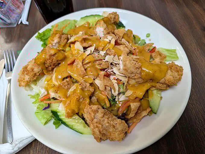 Even the salads at Vic's don't skimp on flavor – crispy chicken strips and cheese sauce transform ordinary greens into something extraordinary.