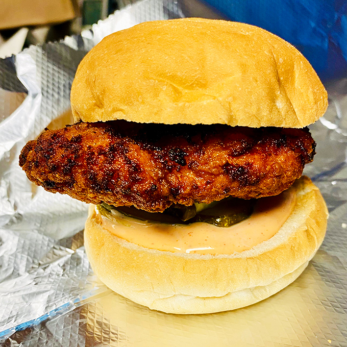 Crispy chicken perfection nestled in a pillowy bun. This sandwich doesn't need fancy aioli or artisanal greens to steal your heart.
