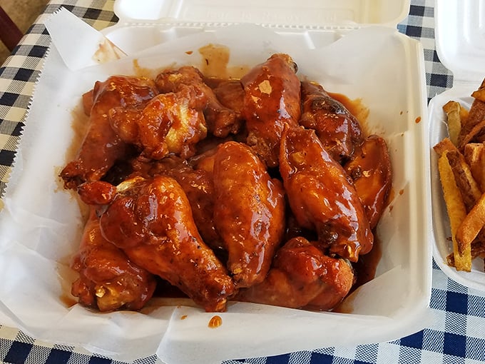 Wings that make you question why anyone would ever bread these beautiful things. Sauce-slathered perfection in every bite.