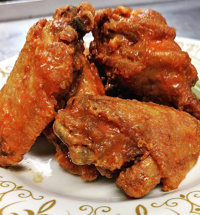 Wings that don't need fancy descriptions—just perfectly crispy, saucy satisfaction that will have you licking your fingers shamelessly.