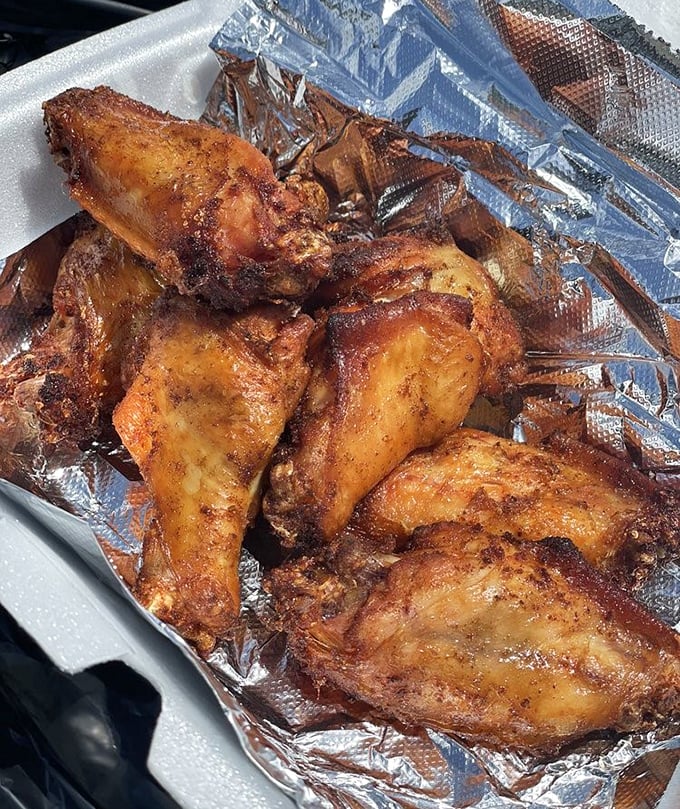Wings that took the scenic route to your plate—slow-smoked then fried for that perfect contrast of textures that makes your taste buds do a double-take.