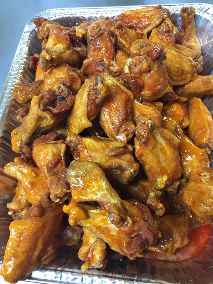 Chicken wings with that perfect balance of vinegary kick and buttery richness—these aren't merely wings, they're flavor vehicles designed for maximum satisfaction.