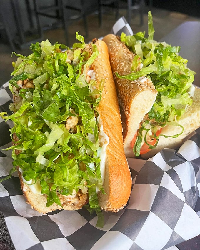 When a cheesesteak and a garden have a beautiful relationship—caramelized meat meets crisp lettuce in a sesame-seeded embrace.