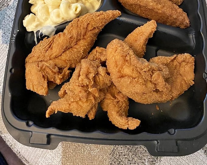 Golden-battered tenders and mac & cheese—proof that sometimes the simplest combinations create the most profound happiness on a plate.