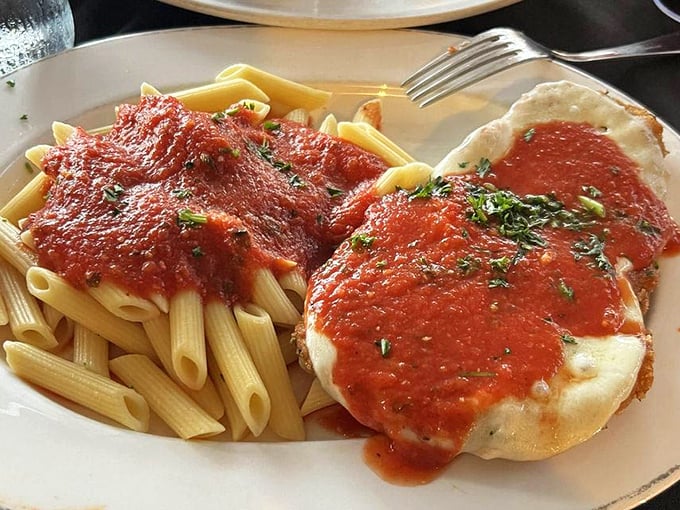 Chicken Parmigiana and penne – the Italian-American dynamic duo that's been making diners happy since before your grandparents had their first date.
