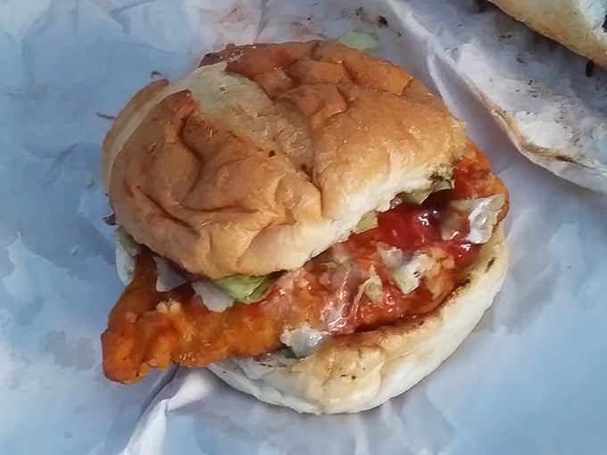 Crispy chicken, fresh toppings, and a pillowy bun—proof that sometimes the simplest pleasures are the most satisfying. No Instagram filter needed here.
