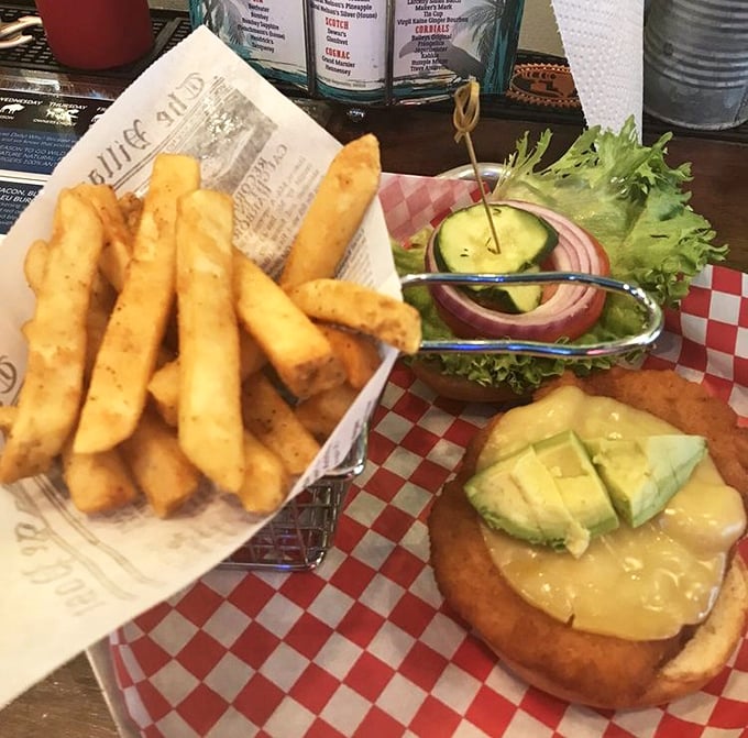 Avocado doesn't just make houses unaffordable for millennials—it makes this chicken sandwich absolutely irresistible, especially with those golden fries alongside.