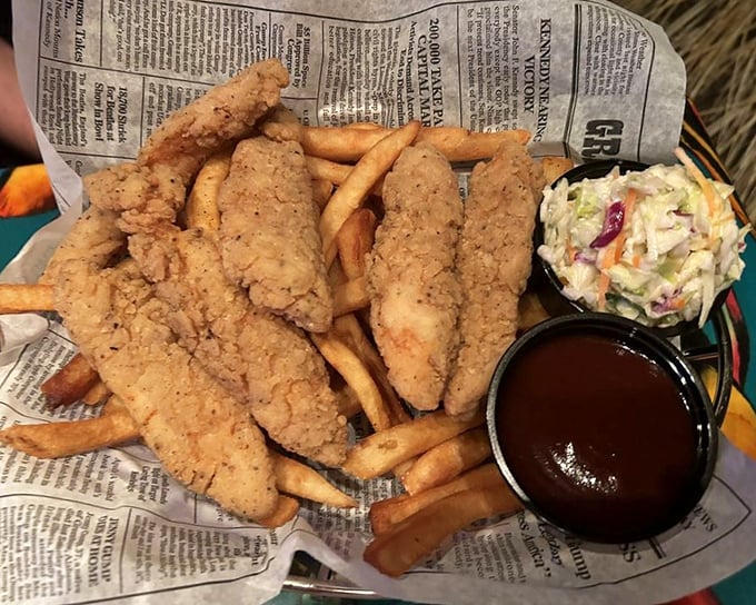 Chicken tenders that actually look like chicken—a rare species in the world of themed restaurants where food quality often goes extinct.
